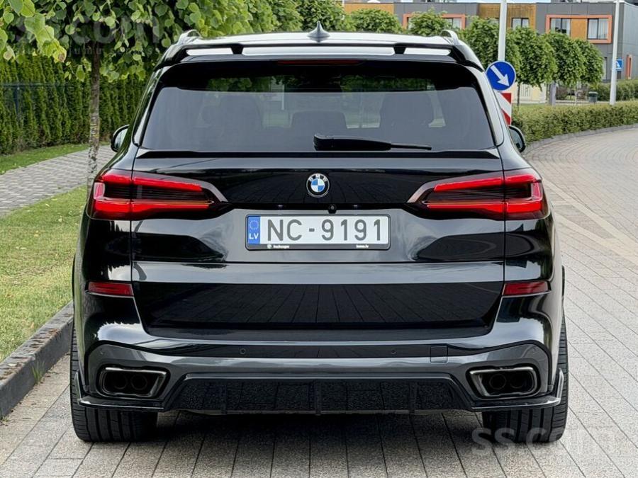 Black BMW X5 2020 in Riga, with an engine capacity of 4.40 L and mileage of 149 thousand km for 49500 €, photo 11 on AUTOMOTO.COM.LV