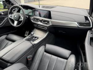 Black BMW X5 2020 in Riga, with an engine capacity of 4.40 L and mileage of 149 thousand km for 49500 €, photo 18 on AUTOMOTO.COM.LV