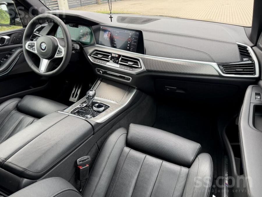 Black BMW X5 2020 in Riga, with an engine capacity of 4.40 L and mileage of 149 thousand km for 49500 €, photo 18 on AUTOMOTO.COM.LV