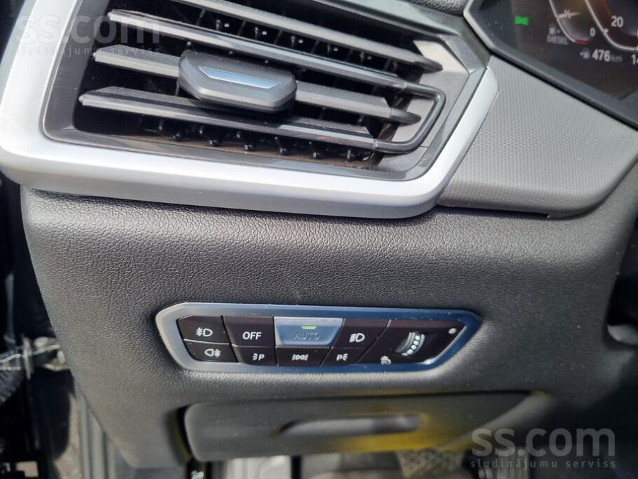 Black BMW X5 2020 in Riga, with an engine capacity of 3.00 L and mileage of 117 thousand km for 34700 €, photo 11 on AUTOMOTO.COM.LV