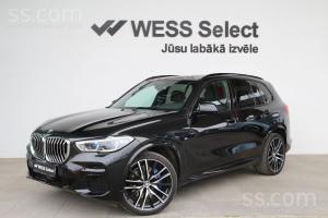 Black BMW X5 2021 in Riga, with an engine capacity of 3.00 L and mileage of 84 thousand km for 56900 €, photo 1 on AUTOMOTO.COM.LV