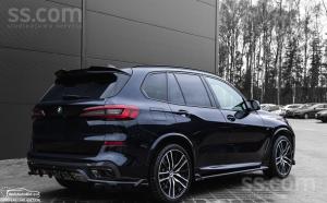 Black BMW X5 2021 in Riga, with an engine capacity of 4.40 L and mileage of 190 thousand km for 49999 €, photo 4 on AUTOMOTO.COM.LV