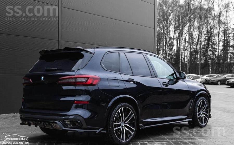 Black BMW X5 2021 in Riga, with an engine capacity of 4.40 L and mileage of 190 thousand km for 49999 €, photo 4 on AUTOMOTO.COM.LV