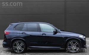 Black BMW X5 2021 in Riga, with an engine capacity of 4.40 L and mileage of 190 thousand km for 49999 €, photo 5 on AUTOMOTO.COM.LV