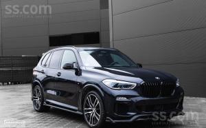 Black BMW X5 2021 in Riga, with an engine capacity of 4.40 L and mileage of 190 thousand km for 49999 €, photo 6 on AUTOMOTO.COM.LV
