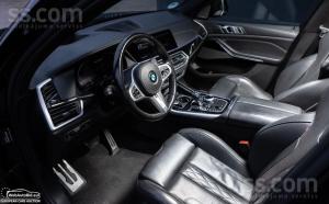 Black BMW X5 2021 in Riga, with an engine capacity of 4.40 L and mileage of 190 thousand km for 49999 €, photo 7 on AUTOMOTO.COM.LV