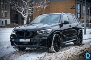 Black BMW X5 2021 in Riga, with an engine capacity of 3.00 L and mileage of 76 thousand km for 52990 €, photo  on AUTOMOTO.COM.LV