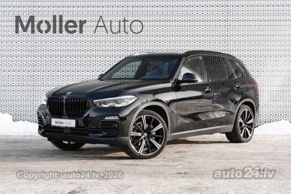 Black BMW X5 2021 in Riga, with an engine capacity of 3.00 L and mileage of 136 thousand km for 42671 €, photo 1 on AUTOMOTO.COM.LV