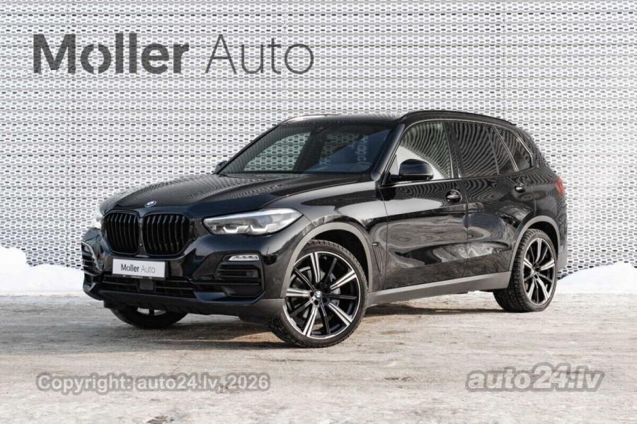 Black BMW X5 2021 in Riga, with an engine capacity of 3.00 L and mileage of 136 thousand km for 42671 €, photo 1 on AUTOMOTO.COM.LV