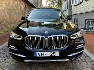 Black BMW X5 2021 in Riga, with an engine capacity of 3.00 L and mileage of 177 thousand km for 40500 €, photo 11 on AUTOMOTO.COM.LV