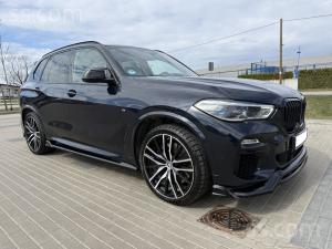Black BMW X5 2021 in Riga, with an engine capacity of 4.40 L and mileage of 195 thousand km for 43000 €, photo 4 on AUTOMOTO.COM.LV