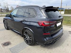 Black BMW X5 2021 in Riga, with an engine capacity of 4.40 L and mileage of 195 thousand km for 43000 €, photo 7 on AUTOMOTO.COM.LV