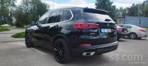 Black BMW X5 2021 in Riga, with an engine capacity of 3.00 L and mileage of 160 thousand km for 40000 €, photo 9 on AUTOMOTO.COM.LV