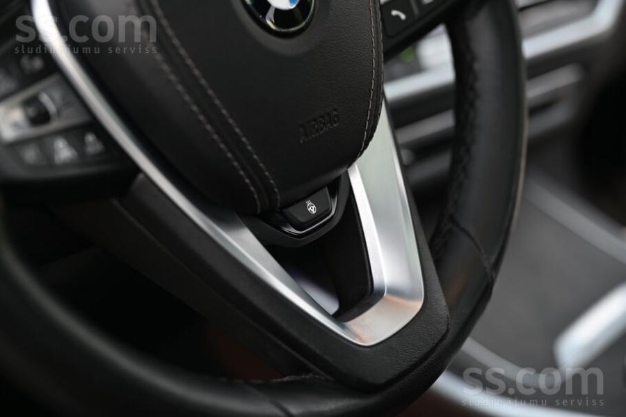 Black BMW X5 2021 in Riga, with an engine capacity of 3.00 L and mileage of 107 thousand km for 52990 €, photo 14 on AUTOMOTO.COM.LV