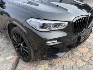 Black BMW X5 2021 in Riga, with an engine capacity of 3.00 L and mileage of 148 thousand km for 51555 €, photo 11 on AUTOMOTO.COM.LV