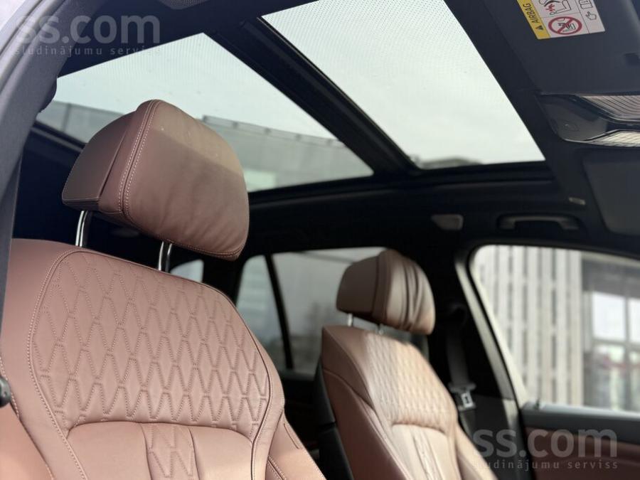 Black BMW X5 2021 in Riga, with an engine capacity of 3.00 L and mileage of 148 thousand km for 51555 €, photo 23 on AUTOMOTO.COM.LV