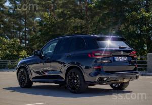 Black BMW X5 2021 in Riga, with an engine capacity of 3.00 L and mileage of 94 thousand km for 49000 €, photo 4 on AUTOMOTO.COM.LV