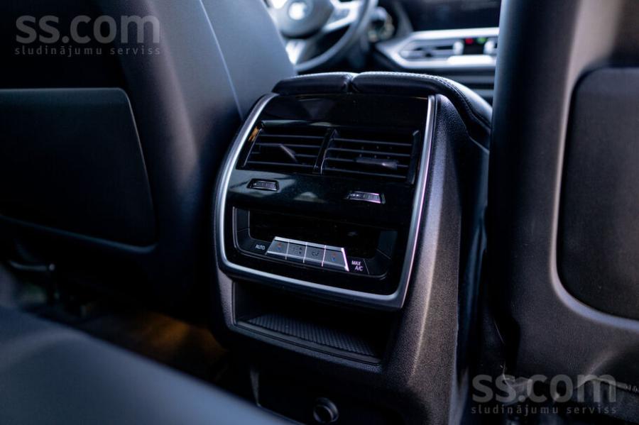Black BMW X5 2021 in Riga, with an engine capacity of 3.00 L and mileage of 94 thousand km for 49000 €, photo 9 on AUTOMOTO.COM.LV