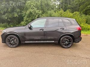 Black BMW X5 2021 in Riga, with an engine capacity of 3.00 L and mileage of 130 thousand km for 47000 €, photo 11 on AUTOMOTO.COM.LV