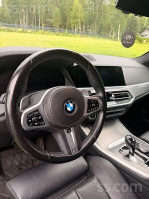 Black BMW X5 2021 in Riga, with an engine capacity of 3.00 L and mileage of 130 thousand km for 47000 €, photo 20 on AUTOMOTO.COM.LV
