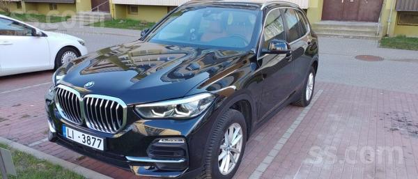Black BMW X5 2021 in Liepaja, with an engine capacity of 3.00 L and mileage of 11 thousand km for 55000 €, photo 1 on AUTOMOTO.COM.LV