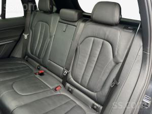Black BMW X5 2021 in Riga, with an engine capacity of 3.00 L and mileage of 102 thousand km for 49900 €, photo 15 on AUTOMOTO.COM.LV