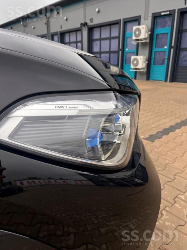 Black BMW X5 2021 in Riga, with an engine capacity of 4.40 L and mileage of 89 thousand km for 53900 €, photo 8 on AUTOMOTO.COM.LV