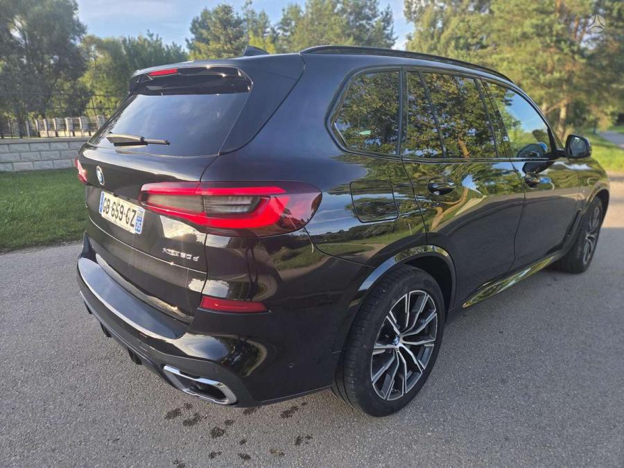 Black BMW X5 2021 in Taurage, with an engine capacity of 2.99 L and mileage of 215 thousand km for 30900 €, photo 20 on AUTOMOTO.COM.LV