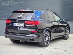 Black BMW X5 2021 in Riga, with an engine capacity of 3.00 L and mileage of 83 thousand km for 42000 €, photo 20 on AUTOMOTO.COM.LV
