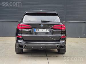 Black BMW X5 2021 in Riga, with an engine capacity of 3.00 L and mileage of 83 thousand km for 42000 €, photo 21 on AUTOMOTO.COM.LV