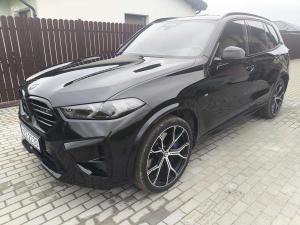 Black BMW X5 2021 in Siauliai, with an engine capacity of 3.00 L and mileage of 129 thousand km for 47400 €, photo 1 on AUTOMOTO.COM.LV