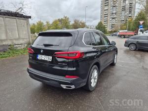 Black BMW X5 2021 in Riga, with an engine capacity of 3.00 L and mileage of 166 thousand km for 33990 €, photo 13 on AUTOMOTO.COM.LV