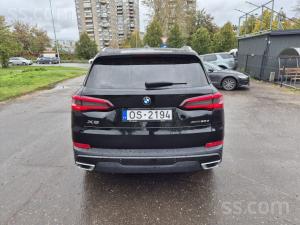 Black BMW X5 2021 in Riga, with an engine capacity of 3.00 L and mileage of 166 thousand km for 33990 €, photo 15 on AUTOMOTO.COM.LV