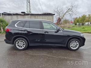 Black BMW X5 2021 in Riga, with an engine capacity of 3.00 L and mileage of 166 thousand km for 33990 €, photo 18 on AUTOMOTO.COM.LV