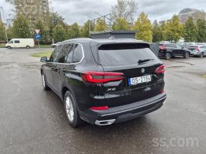 Black BMW X5 2021 in Riga, with an engine capacity of 3.00 L and mileage of 166 thousand km for 33990 €, photo 17 on AUTOMOTO.COM.LV