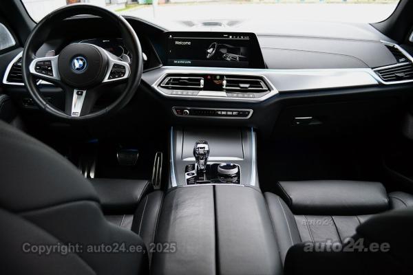 Black BMW X5 2022 in Riga, with an engine capacity of 3.00 L and mileage of 74 thousand km for 66900 €, photo 11 on AUTOMOTO.COM.LV