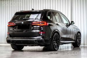 Melns BMW X5 2022 Tukums, ar dzinēja tilpumu 3.00 L un nobraukumu 0 tūkst. km par 59990 €, foto 4 vietnē AUTOMOTO.COM.LV