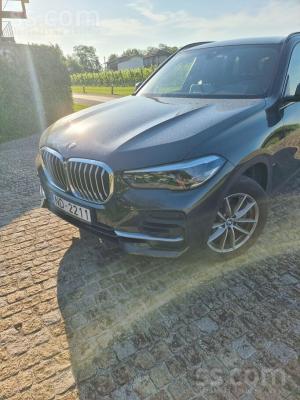 Black BMW X5 2022 in Riga, with an engine capacity of 3.00 L and mileage of 100 thousand km for 44500 €, photo  on AUTOMOTO.COM.LV