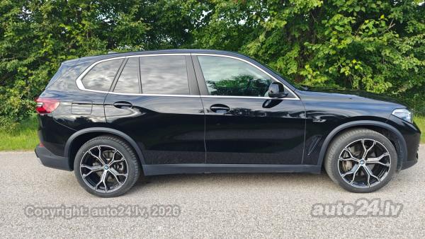 Black BMW X5 2022 in Tallinn, with an engine capacity of 3.00 L and mileage of 131 thousand km for 55900 €, photo 6 on AUTOMOTO.COM.LV