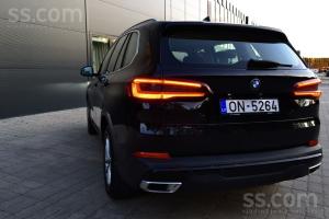 Black BMW X5 2022 in Riga, with an engine capacity of 3.00 L and mileage of 71 thousand km for 45000 €, photo 20 on AUTOMOTO.COM.LV