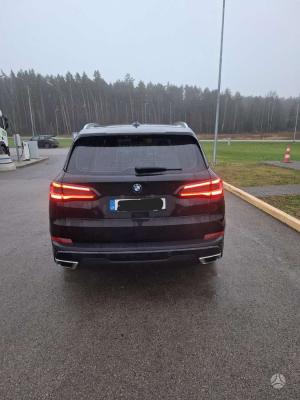 Black BMW X5 2023 in Riga, with an engine capacity of 2.99 L and mileage of 64 thousand km for 46000 €, photo 5 on AUTOMOTO.COM.LV