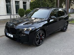 Black BMW X5 2023 in Jurmala, with an engine capacity of 3.00 L and mileage of 77 thousand km for 79777 €, photo  on AUTOMOTO.COM.LV