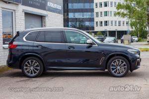 Black BMW X5 2023 in Tallinn, with an engine capacity of 4.40 L and mileage of 65 thousand km for 62900 €, photo 5 on AUTOMOTO.COM.LV