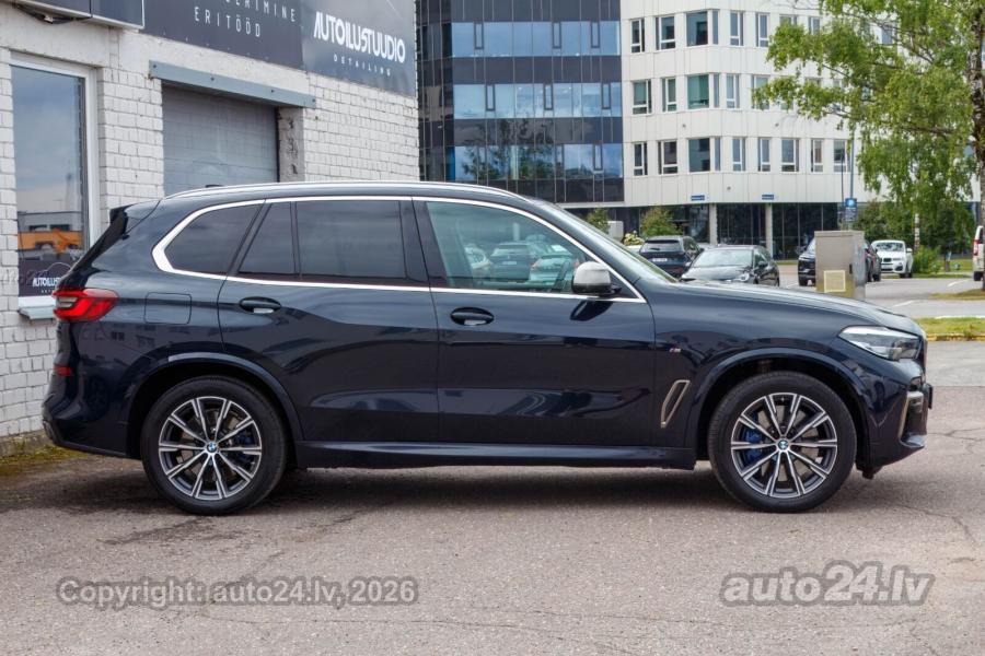 Black BMW X5 2023 in Tallinn, with an engine capacity of 4.40 L and mileage of 65 thousand km for 62900 €, photo 5 on AUTOMOTO.COM.LV