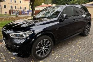Black BMW X5 2023 in Vilnius, with an engine capacity of 2.99 L and mileage of 58 thousand km for 57900 €, photo 4 on AUTOMOTO.COM.LV