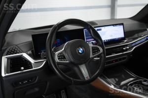 Black BMW X5 2023 in Tukums, with an engine capacity of 3.00 L and mileage of 99 thousand km for 69990 €, photo 25 on AUTOMOTO.COM.LV