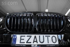 Black BMW X5 2023 in Tukums, with an engine capacity of 3.00 L and mileage of 99 thousand km for 69990 €, photo 36 on AUTOMOTO.COM.LV