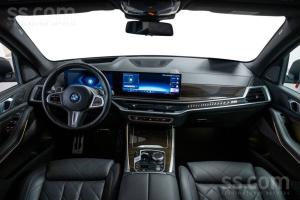 Black BMW X5 2024 in Riga, with an engine capacity of 3.00 L and mileage of 88 thousand km for 69500 €, photo 6 on AUTOMOTO.COM.LV
