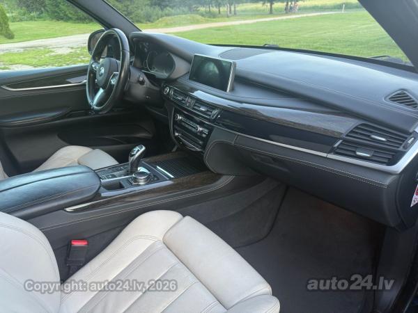 Black BMW X5 2016 in Tartu, with an engine capacity of 3.00 L and mileage of 198 thousand km for 21000 €, photo 5 on AUTOMOTO.COM.LV