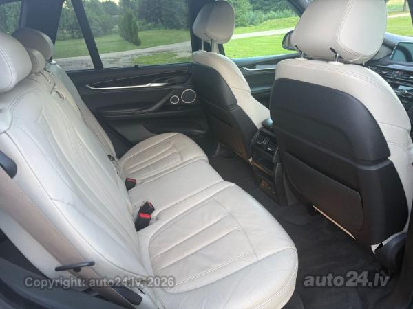 Black BMW X5 2016 in Tartu, with an engine capacity of 3.00 L and mileage of 198 thousand km for 21000 €, photo 7 on AUTOMOTO.COM.LV